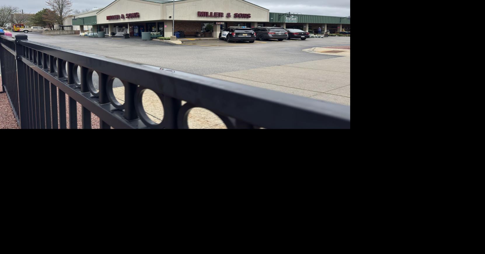 Person pinned between car and outdoor display at Verona grocery store ...