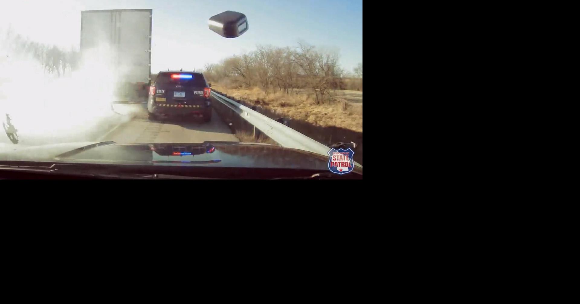 Video shows semi hit Wisconsin State Patrol cruiser along interstate ...