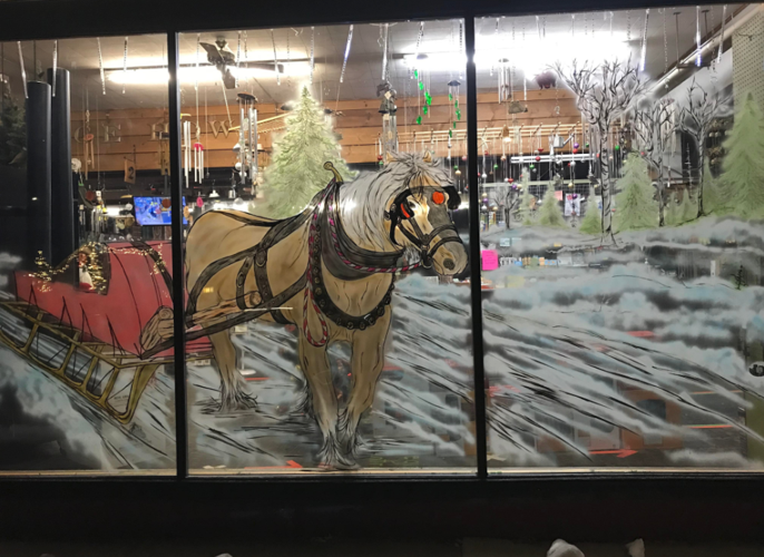 Local Inlet woman decorates store windows to perfection for the ...