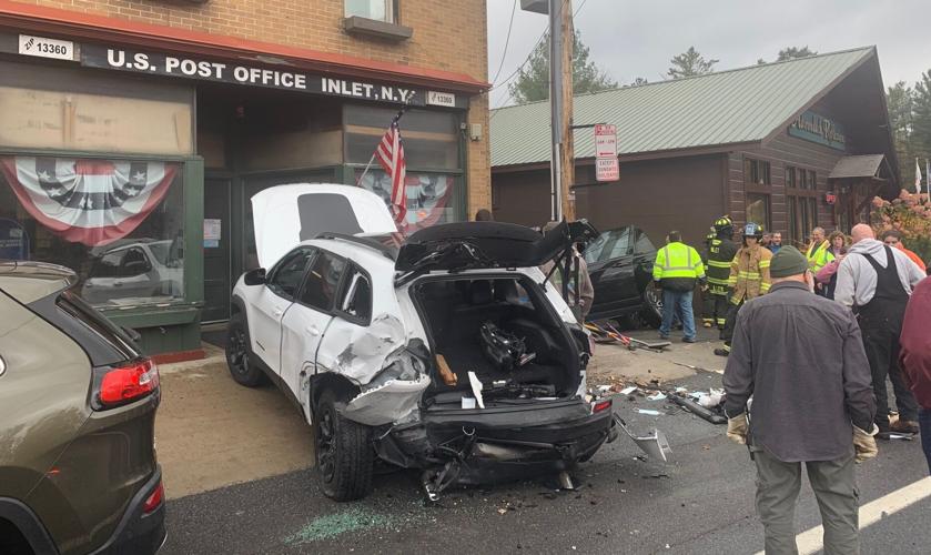 Range Rover crashes into parked SUV outside Inlet post office; 2 sent ...