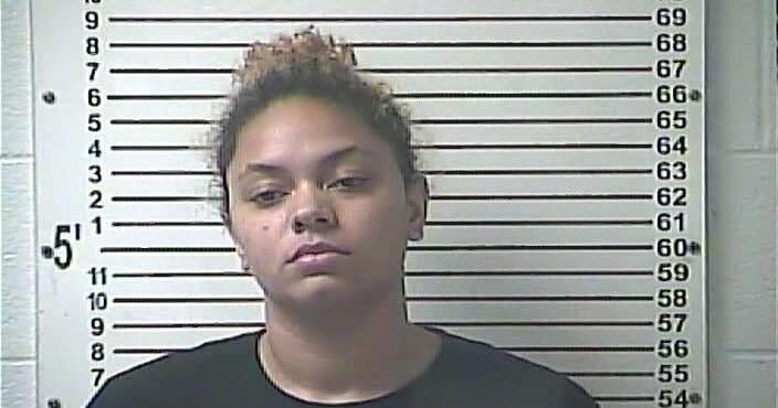 Kentucky woman arrested after 21 dead dogs found in home, police say ...