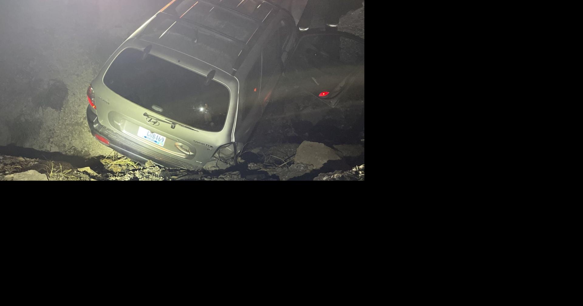 Woman, teens injured after SUV drives into open washout caused by ...