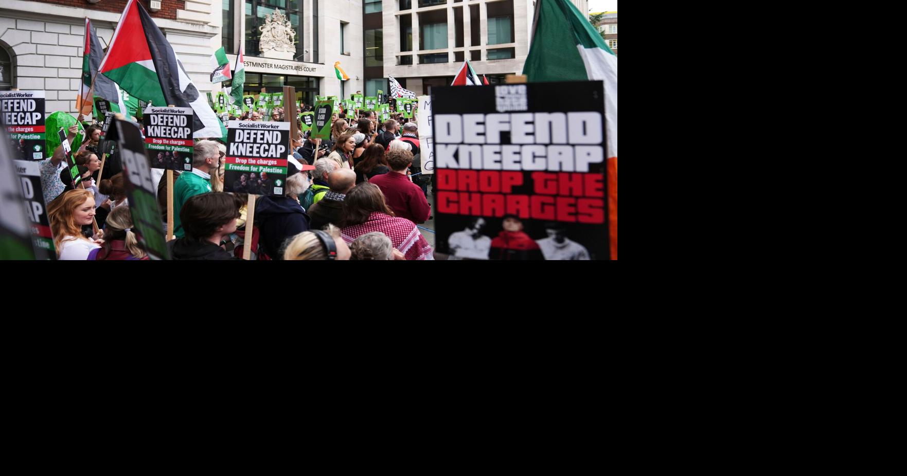 Hundreds of protesters turn up to support Irish rapper as he appears in ...