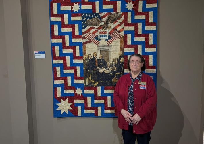 Ceremony honors veterans with quilts at the National Quilt Museum ...