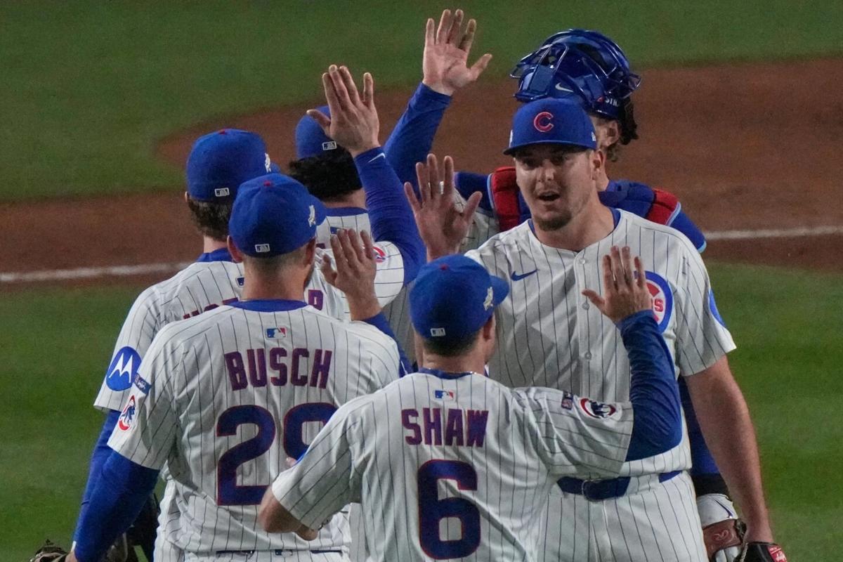 Cubs use 4-run 1st inning to top the Brewers 4-3 and avoid NL Division ...