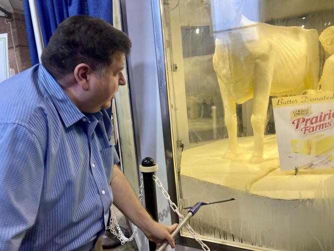 Illinois Gov. Pritzker unveils butter cow and the state fair's theme ...