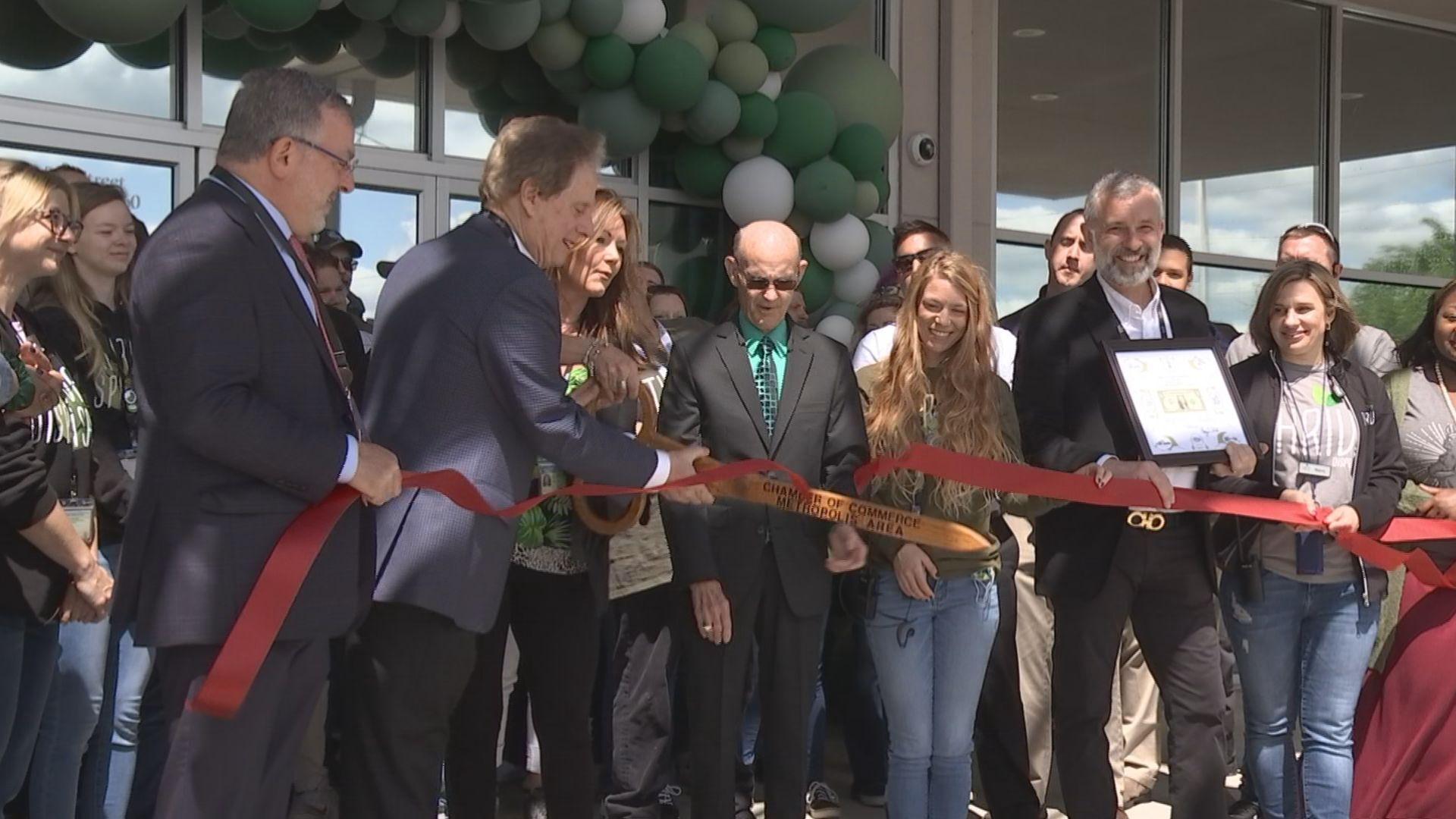 Dozens line up for grand opening of first marijuana dispensary in ...