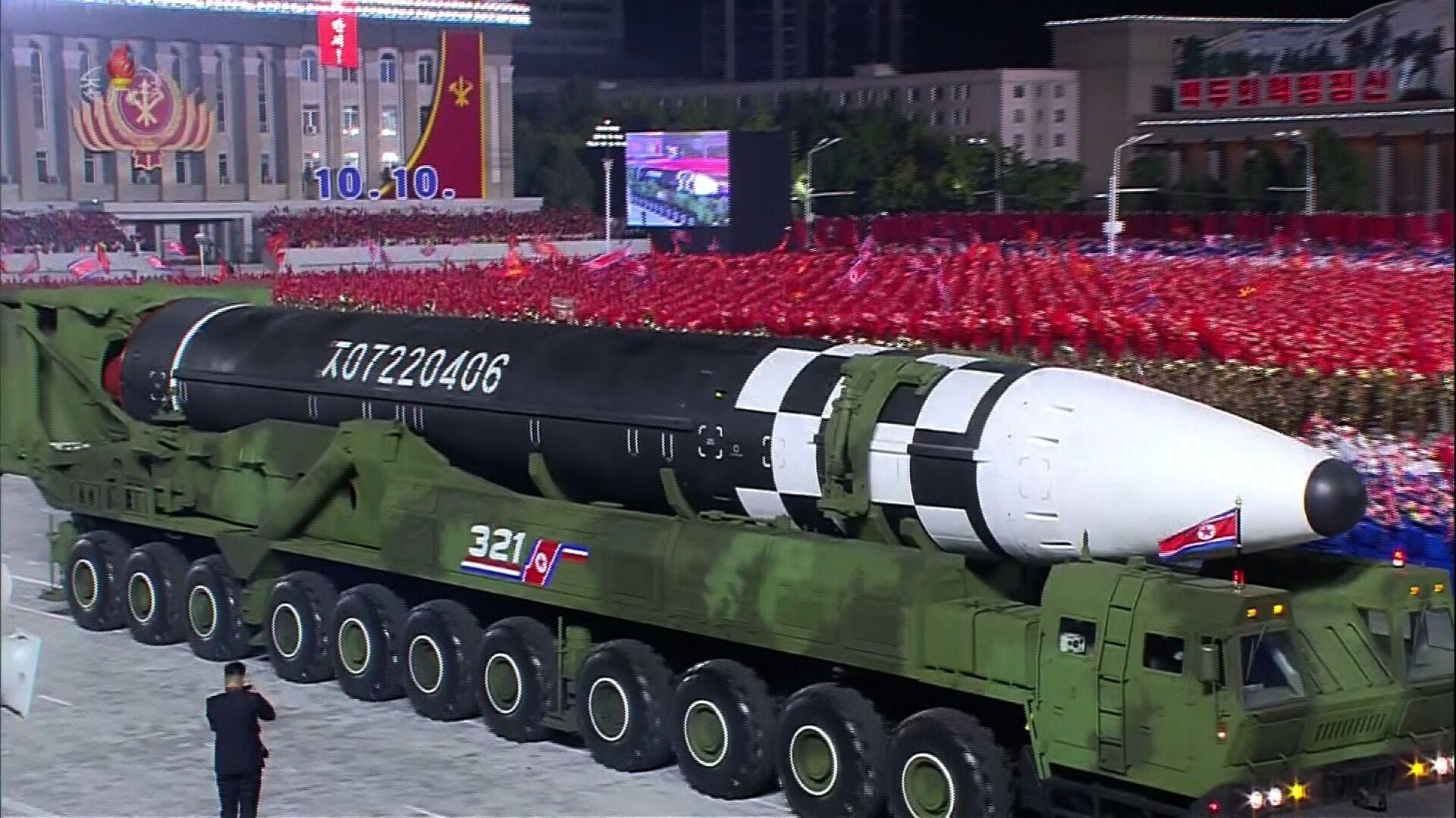 North Korea unveils massive new ballistic missile in military parade ...