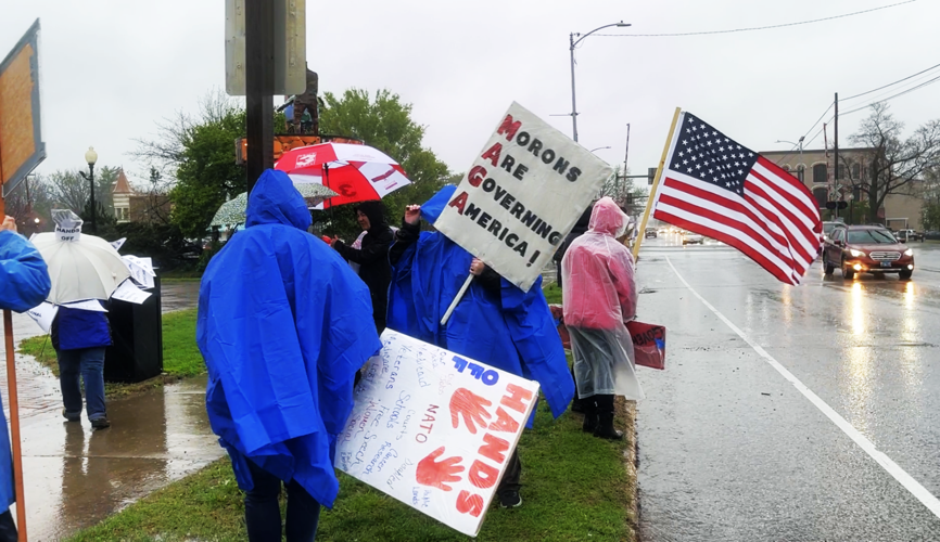 Even after rain cancellation, 450 people protest Trump with Hands Off ...