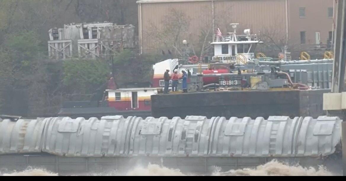 Salvage operations underway to remove two barges stuck in Ohio River ...