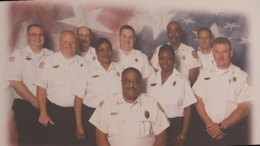 Local community takes a moment to honor historic Fire Chief Redell ...