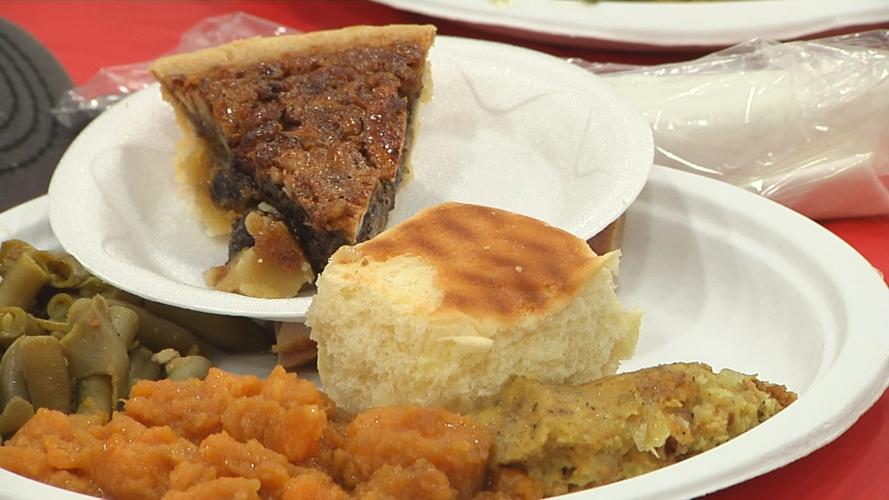 Church dinner celebrates Christmas spirit and helps people who may be ...