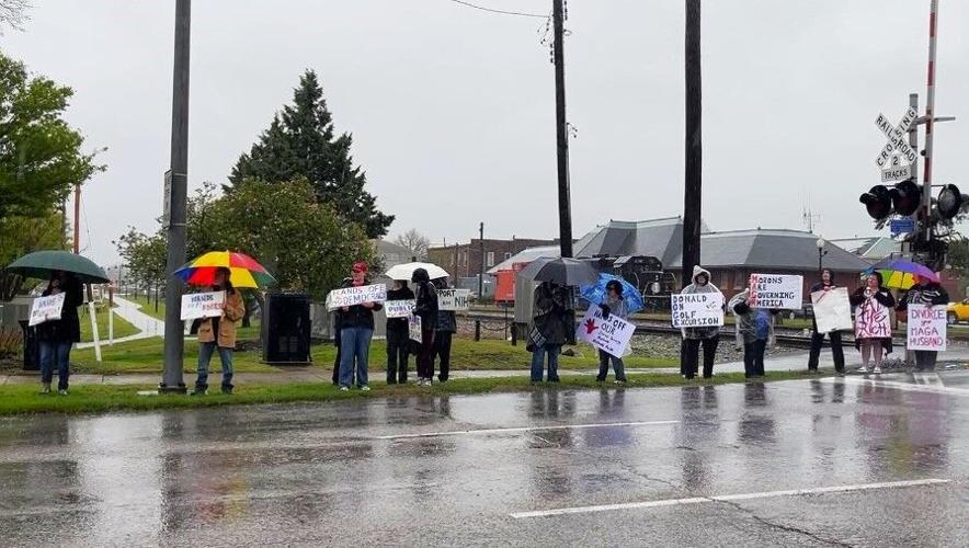 Even after rain cancellation, 450 people protest Trump with Hands Off ...