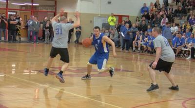 Special Olympians take down Chippewa Falls PD in 35th annual basketball ...