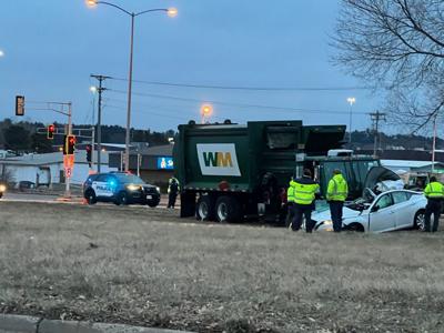 Two injured after car crashes into garbage truck on Hwy 93 in Eau ...