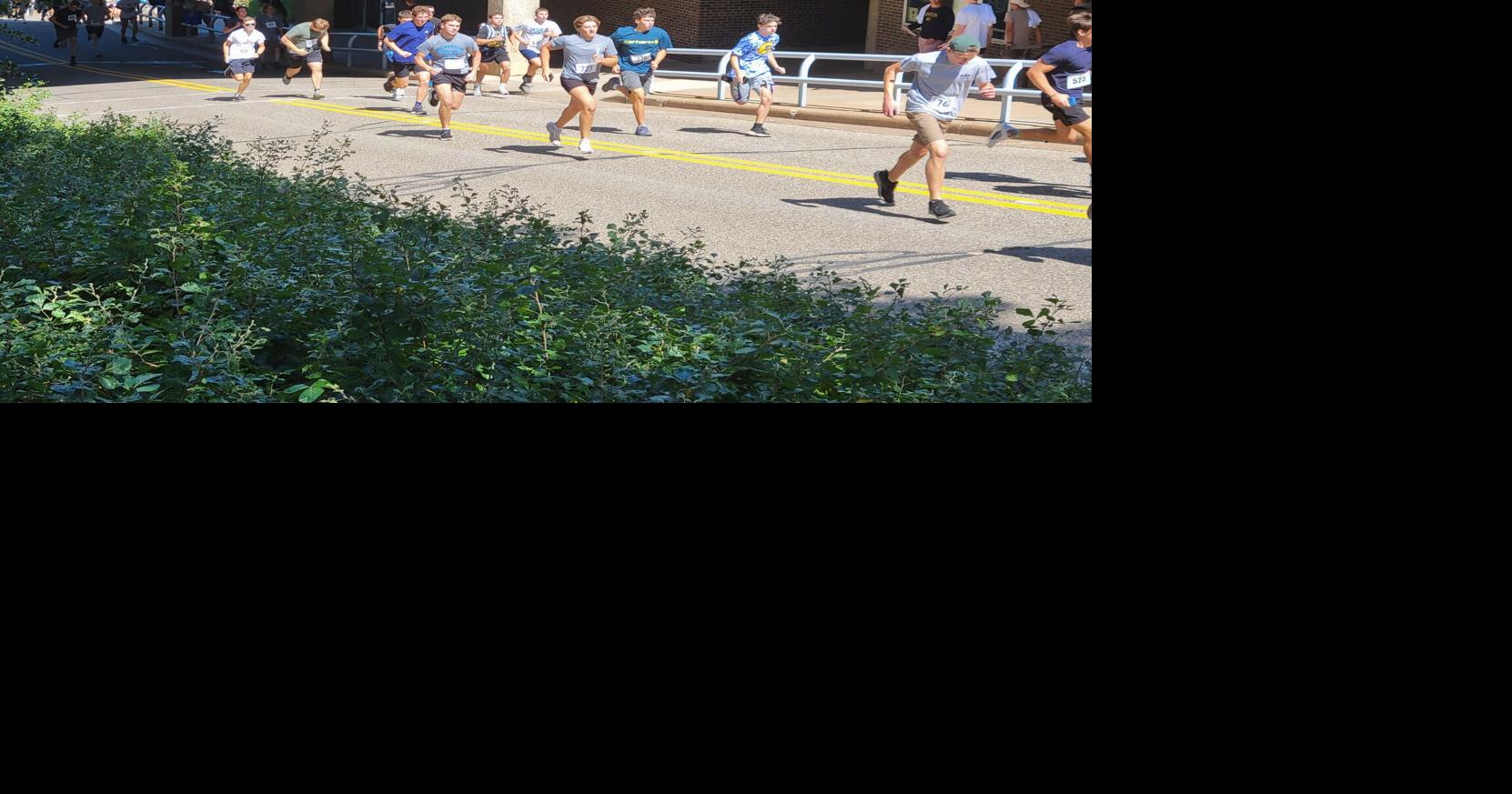 UWEC students run the hill getting ready for new semester | Eye On Eau ...