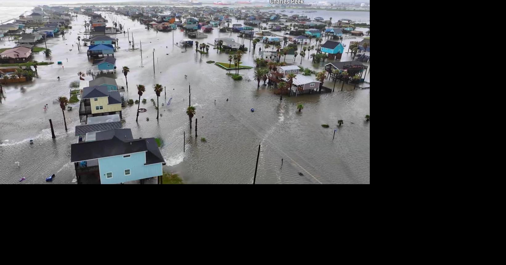 Flooding throughout Surfside Beach, TX, waves crash on shore and flood ...