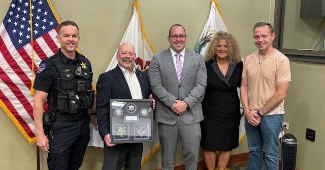 Outgoing Oswego Police Commissioner recognized for 10 years of service ...