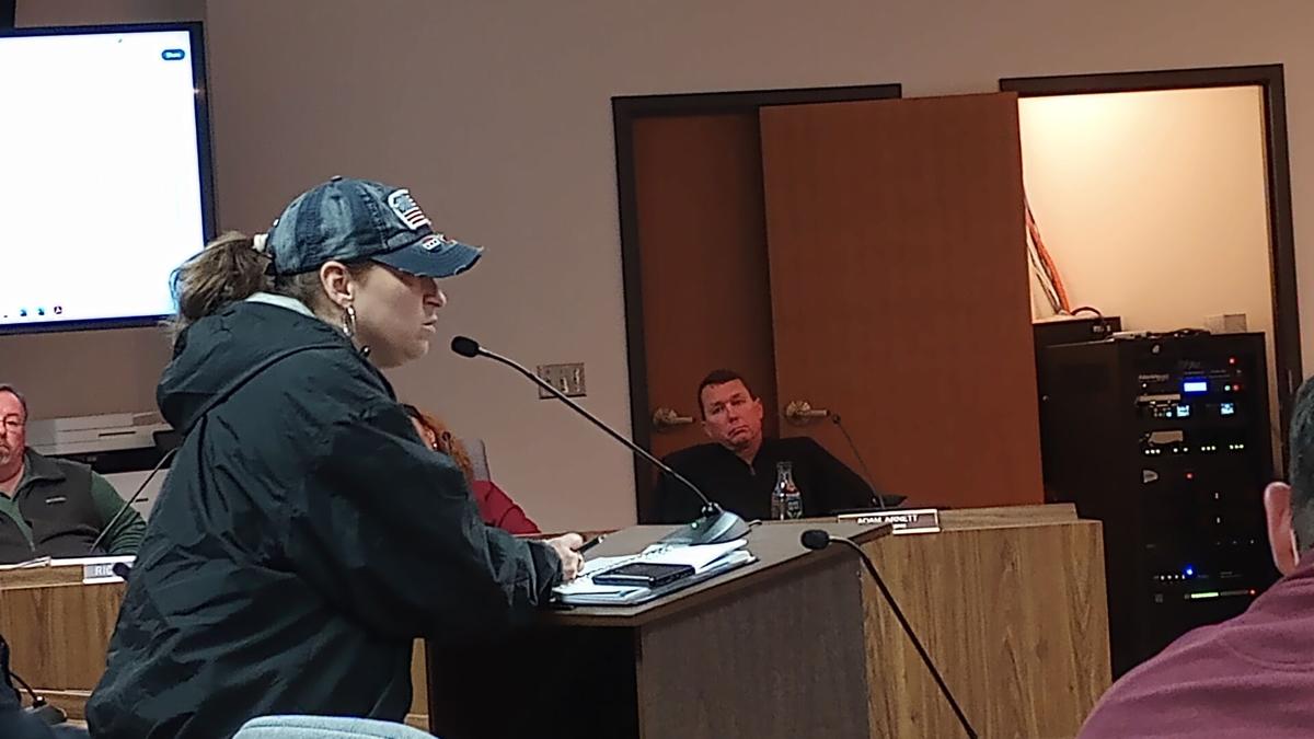 Sandwich woman asks city to ban unscheduled stops for immigrant buses ...