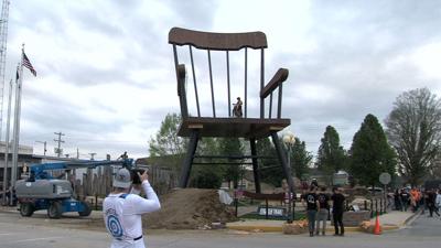One man takes a brave jump on the World's Largest Rocking Chair ...