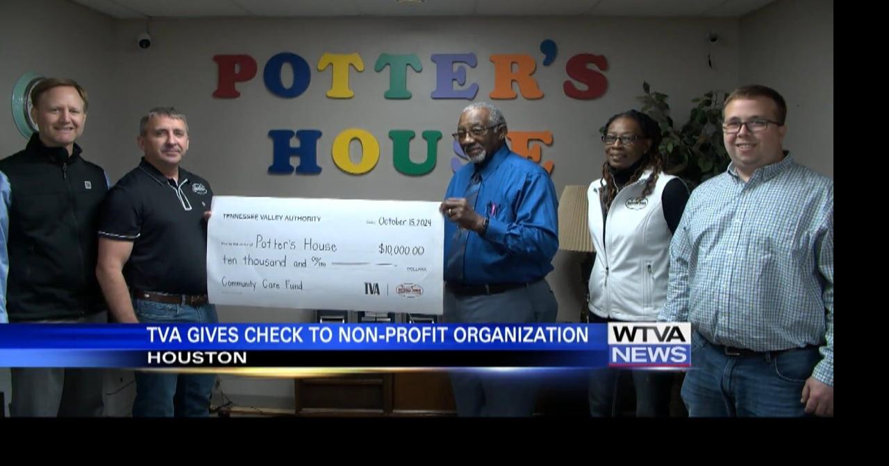 Natchez Trace Electric and TVA present check to non-profit organization ...