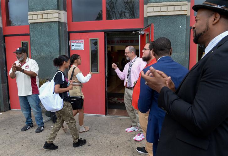 West Side schools celebrate first day with community greeters ...