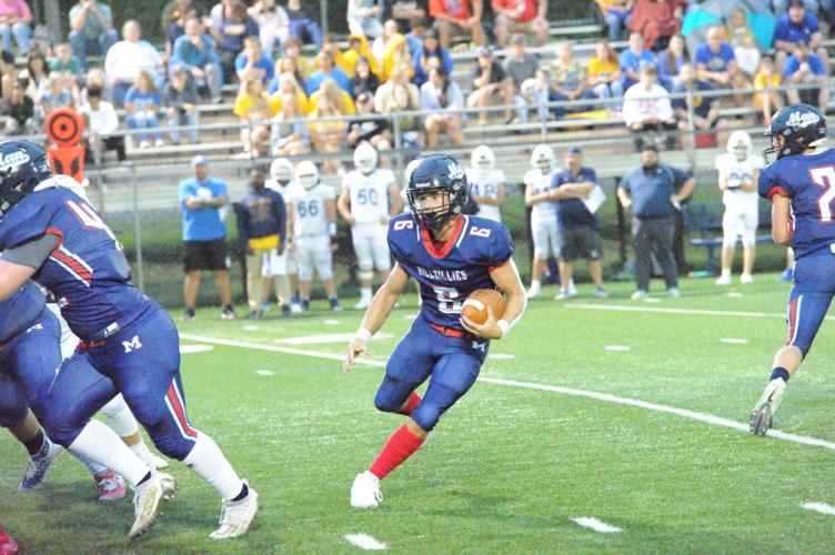 Man football cruises past Logan 35-7 in season opener | Sports ...