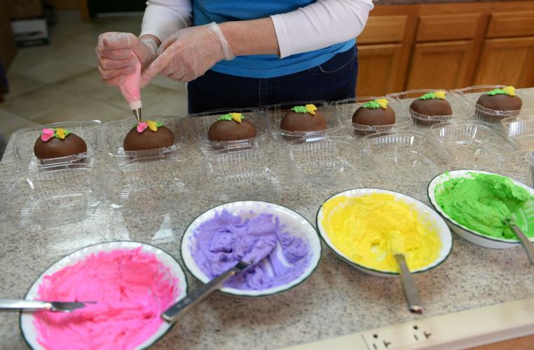 Volunteers hatch a library with beloved edible Easter eggs | Life ...