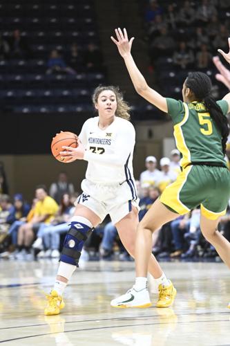WVU basketball: Watson, Okani parallel performers in multifaceted ...