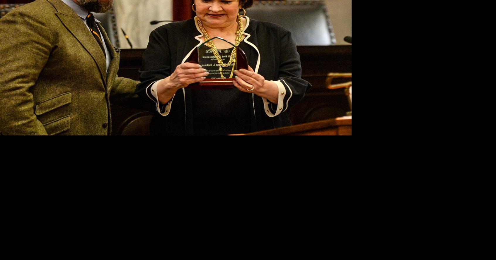 State trial lawyers present former Supreme Court justice Workman with ...