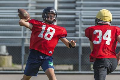 Prep football notebook: QB battle underway at Nitro | Football ...
