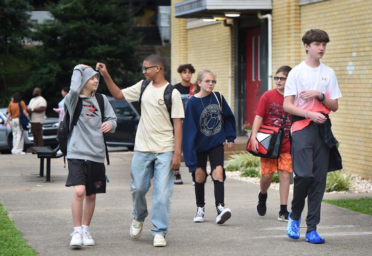 West Side schools celebrate first day with community greeters ...