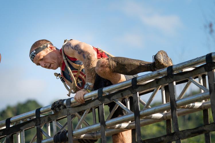 This is Spartan Race: Climbing ropes, crawling through mud and singing ...