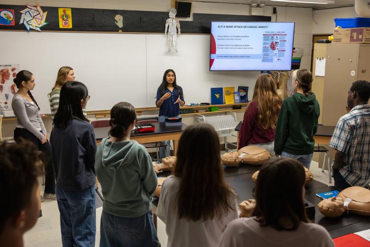 George Washington High School Heart Club teaching CPR | Education ...
