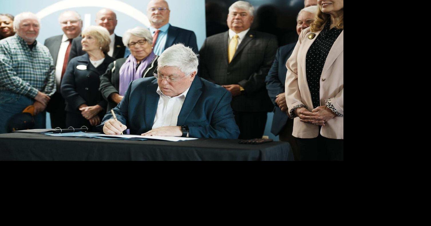 Morrisey celebrates signing of three bills at Beckley church ...
