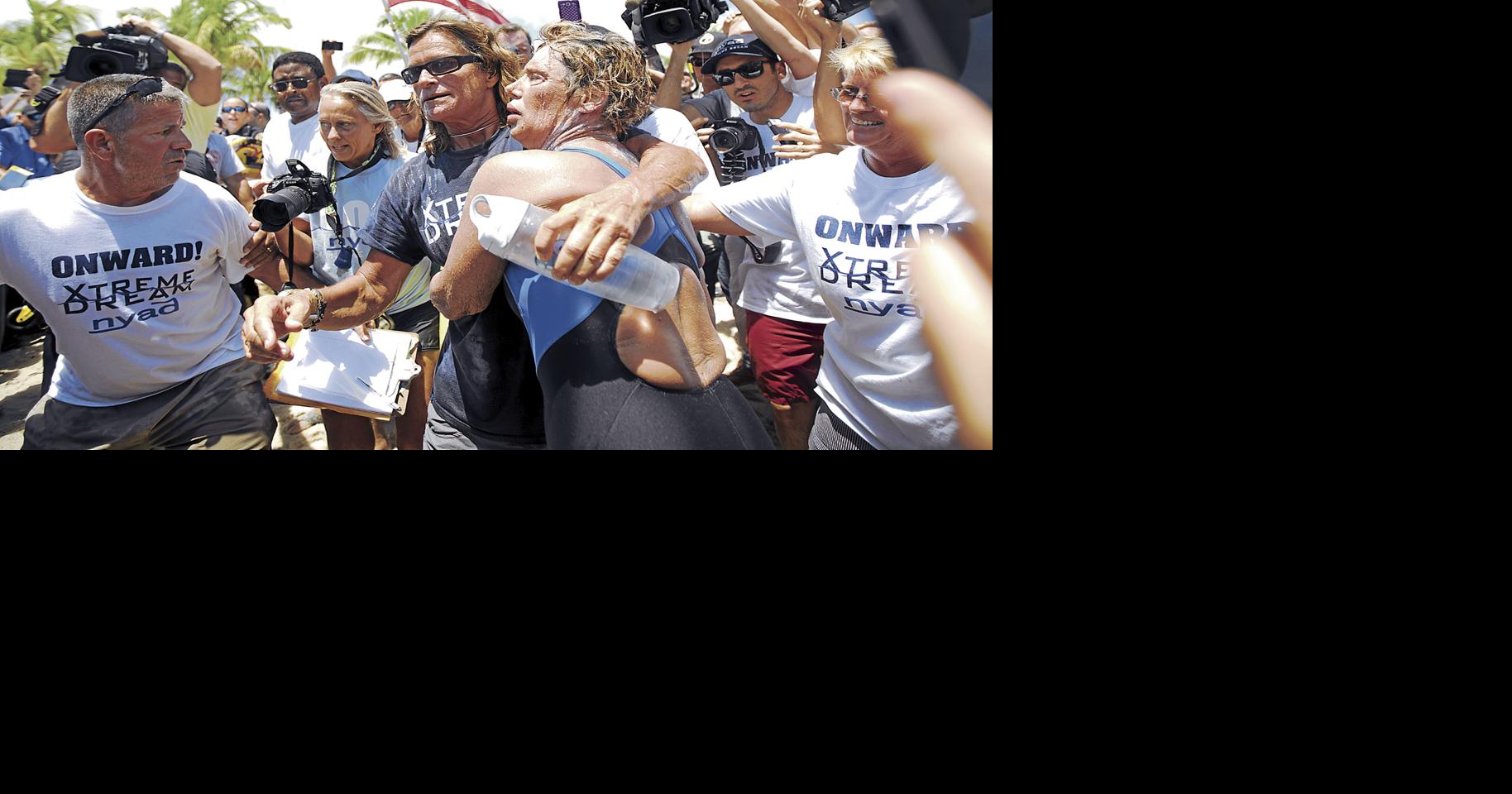 Diana Nyad, 64, completes historic swim from Cuba to Florida without ...