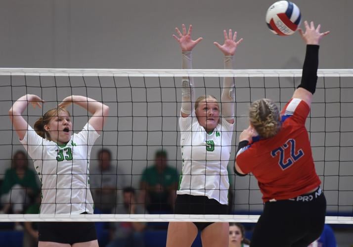 Prep volleyball: Ahaziah Smith helps Hoover spike Charleston Catholic ...