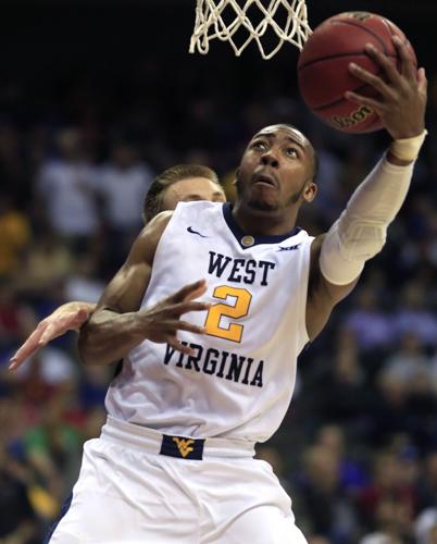 WVU’s Jevon Carter holds his own in Big 12 full of good point guards ...