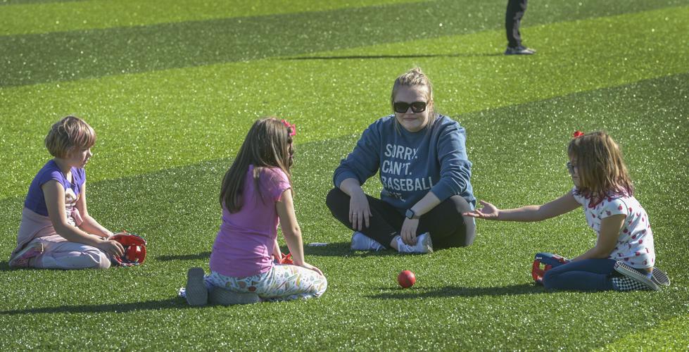 Visually impaired students learn baseball with the Dirty Birds ...