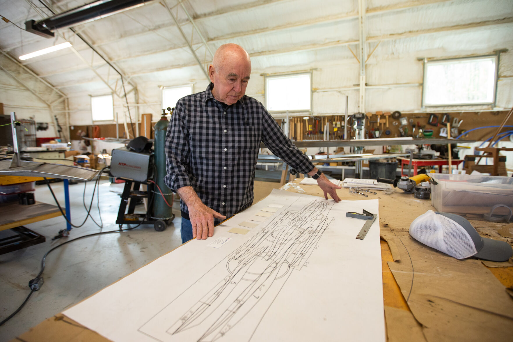 Artist Jonathan Cox sculpts 'River Flow' for Slack Plaza | Kanawha ...