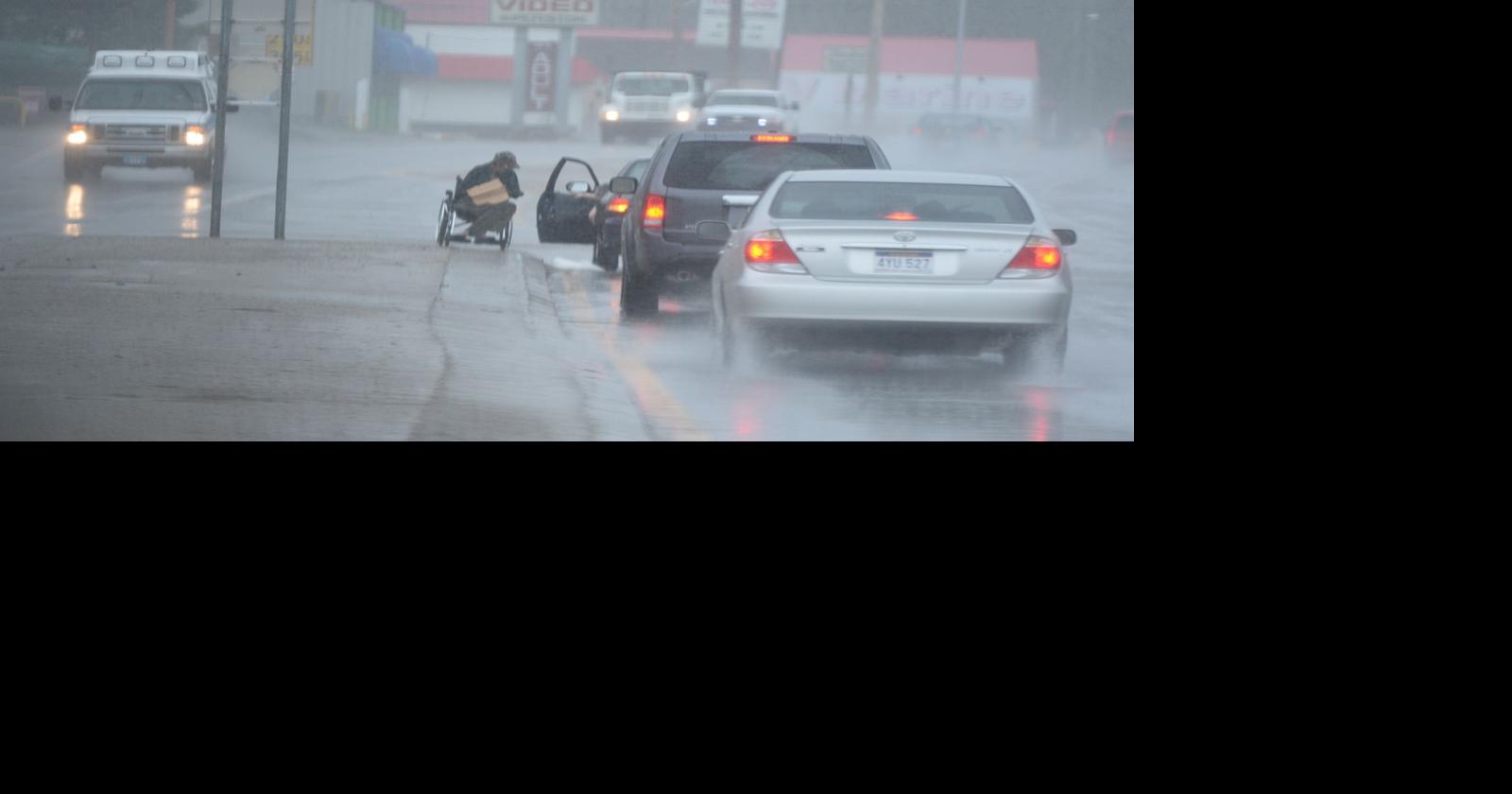 Photo: Veteran stuck in dismal downpour | Life & Arts | wvgazettemail.com
