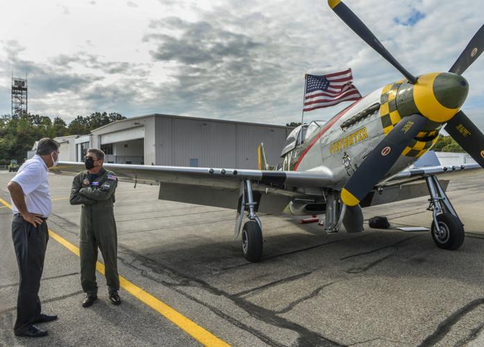 Rare B-29 Superfortress takes flight over the green, rolling hills of ...