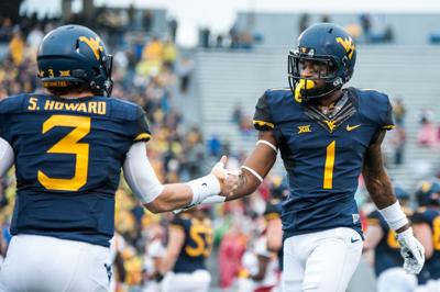 WVU quarterback Skyler Howard shares strong connection with receivers ...
