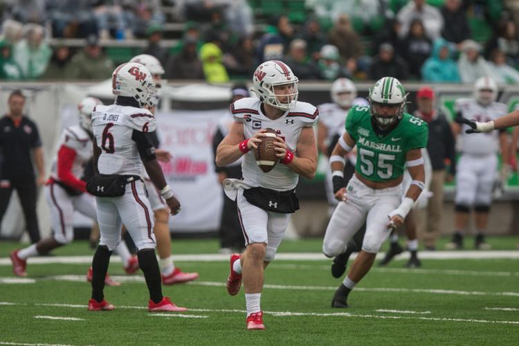 Marshall football notebook: Weather played a factor in play calling ...