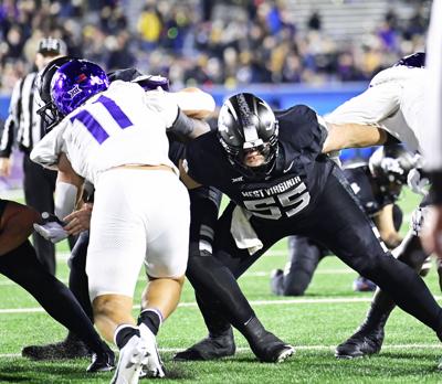 WVU football: Mountaineers' offensive line getting more push of late ...