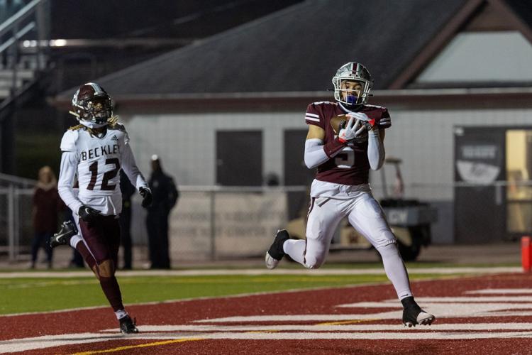 Prep football: Patriots come up big in big one, busting Woodrow ...