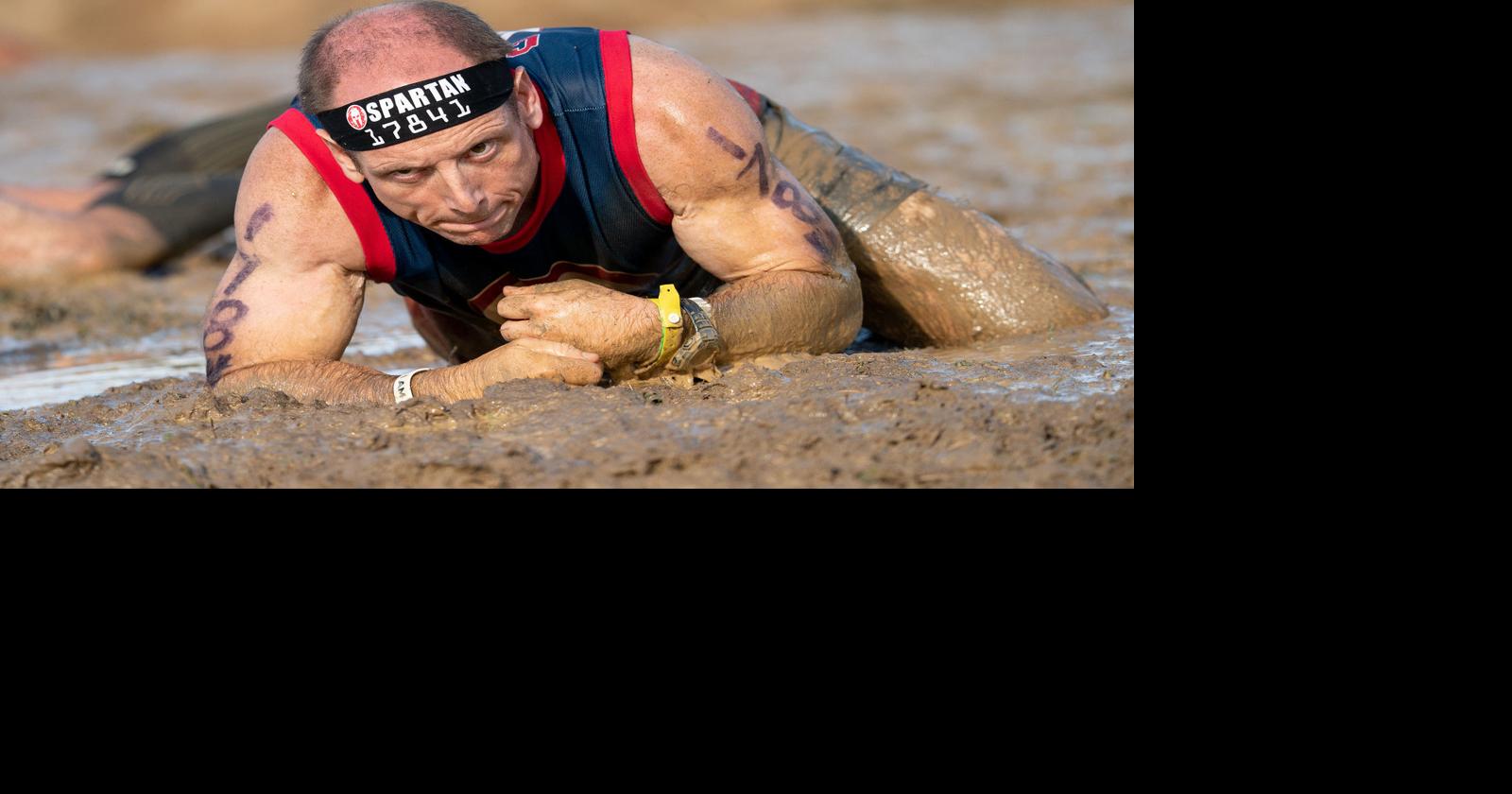 This is Spartan Race: Climbing ropes, crawling through mud and singing ...