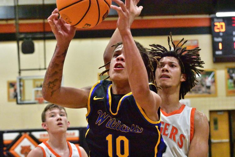 Prep boys basketball: Chapmanville holds off Logan 66-56, sweeps season ...