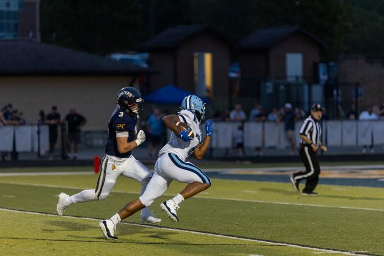 Prep football: Huskies overcome delay, large deficit to get past ...