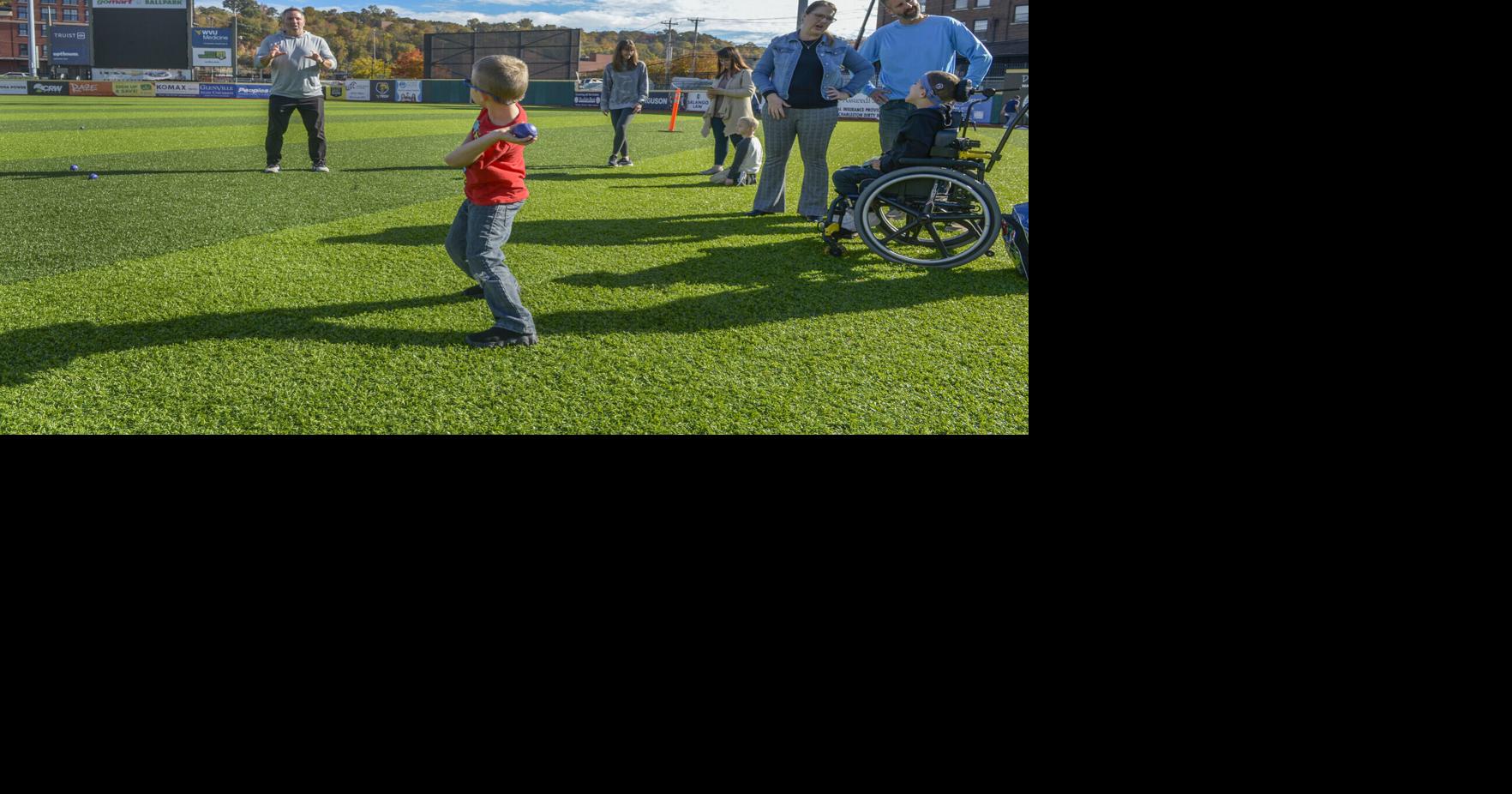 Visually impaired students learn baseball with the Dirty Birds ...